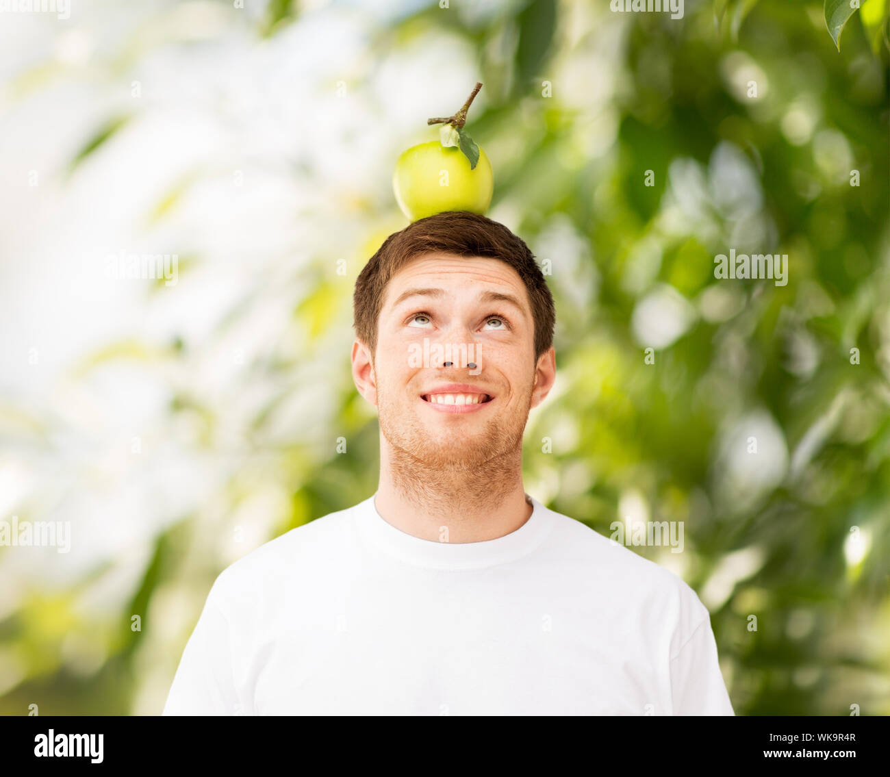 Young guy apple on head hi-res stock photography and images - Alamy
