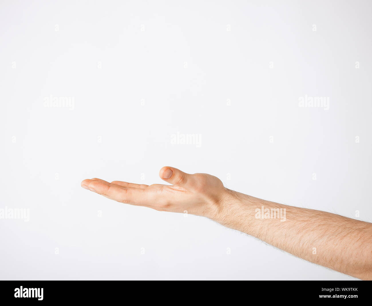 Mans hand holding something hi-res stock photography and images - Alamy