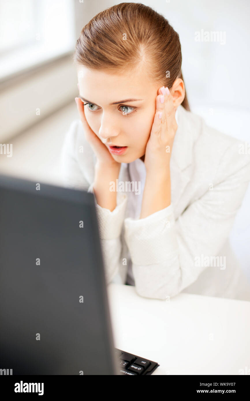 stressed businesswoman with computer Stock Photo - Alamy