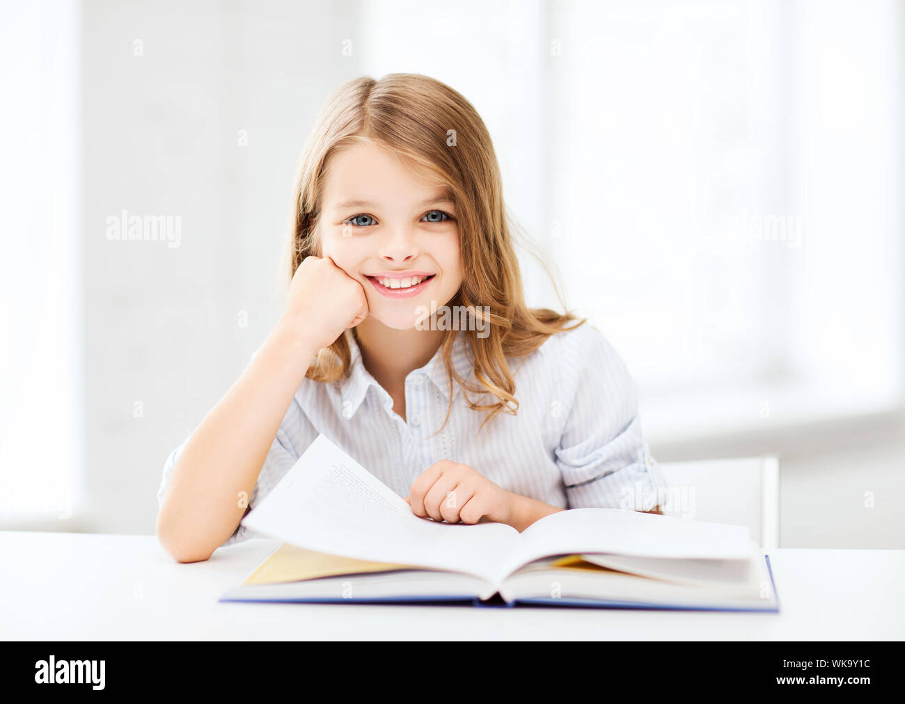little student girl studying at school Stock Photo - Alamy