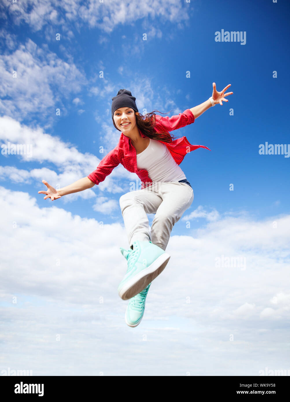 beautiful dancing girl jumping Stock Photo - Alamy