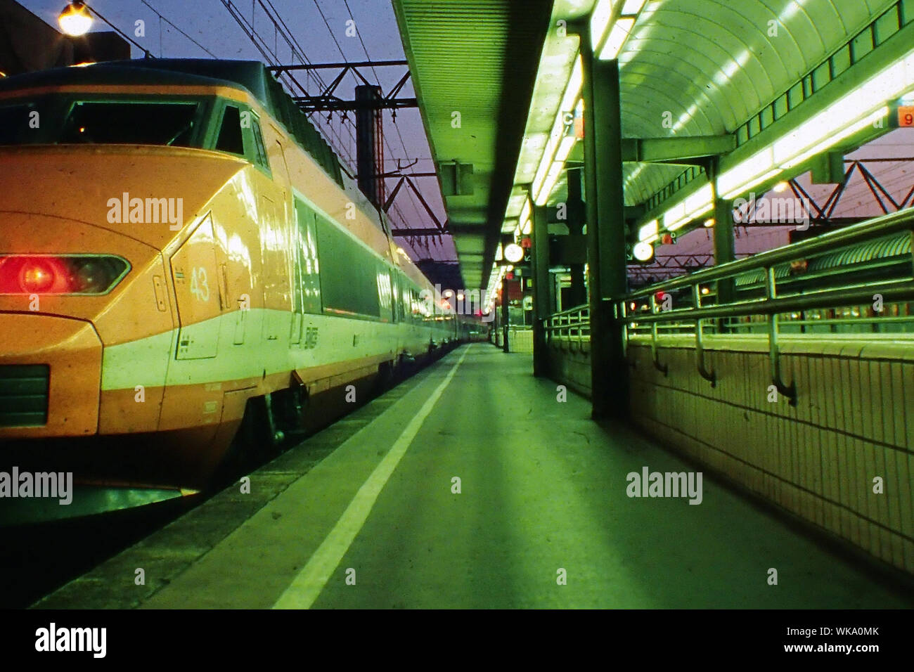 Train At Illuminated Railroad Station During Night Stock Photo - Alamy