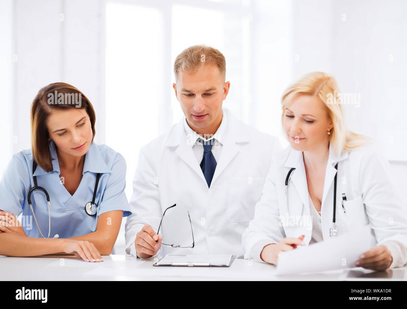 team or group of doctors on meeting Stock Photo - Alamy