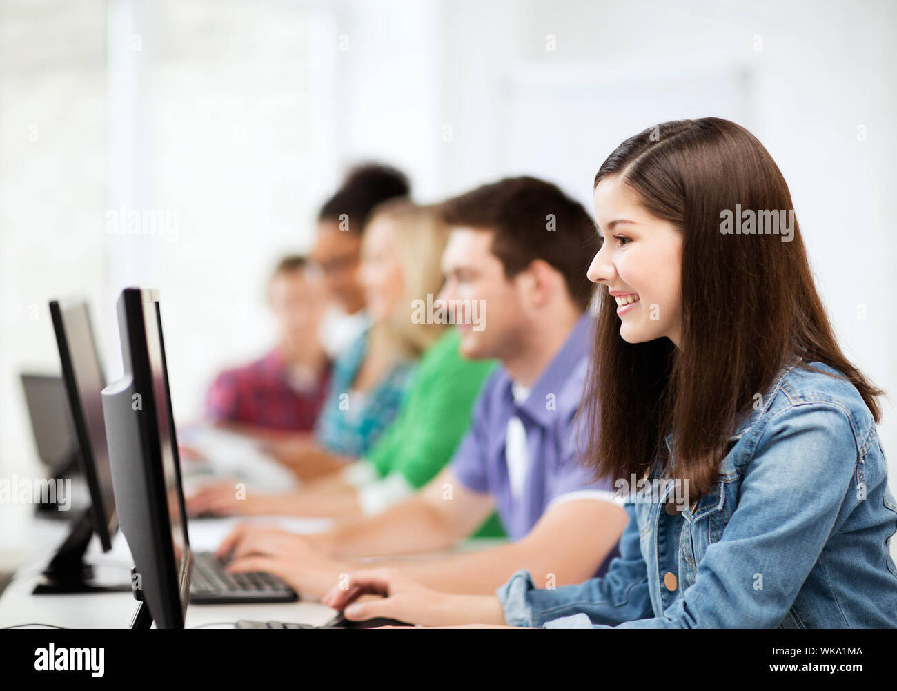 students with computers studying at school Stock Photo - Alamy