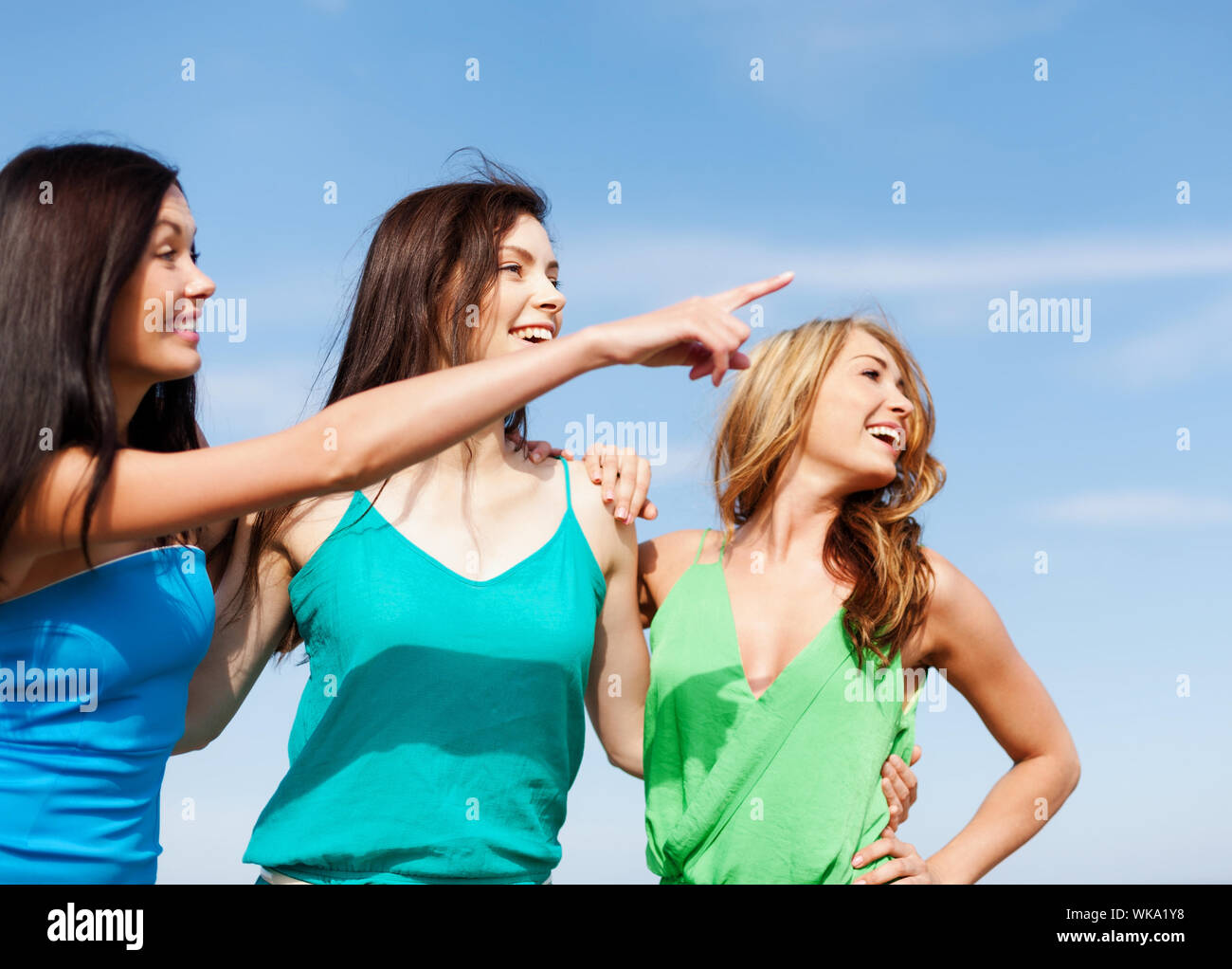Group Of Girls Laughing Pointing High Resolution Stock Photography and ...