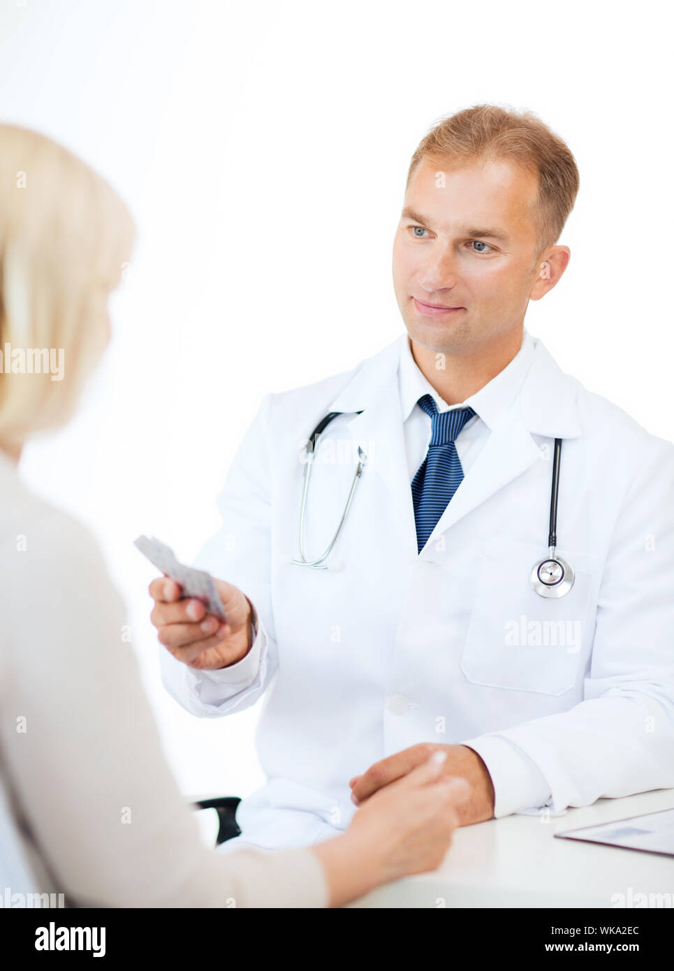 Doctor prescribing antibiotics hi-res stock photography and images - Alamy