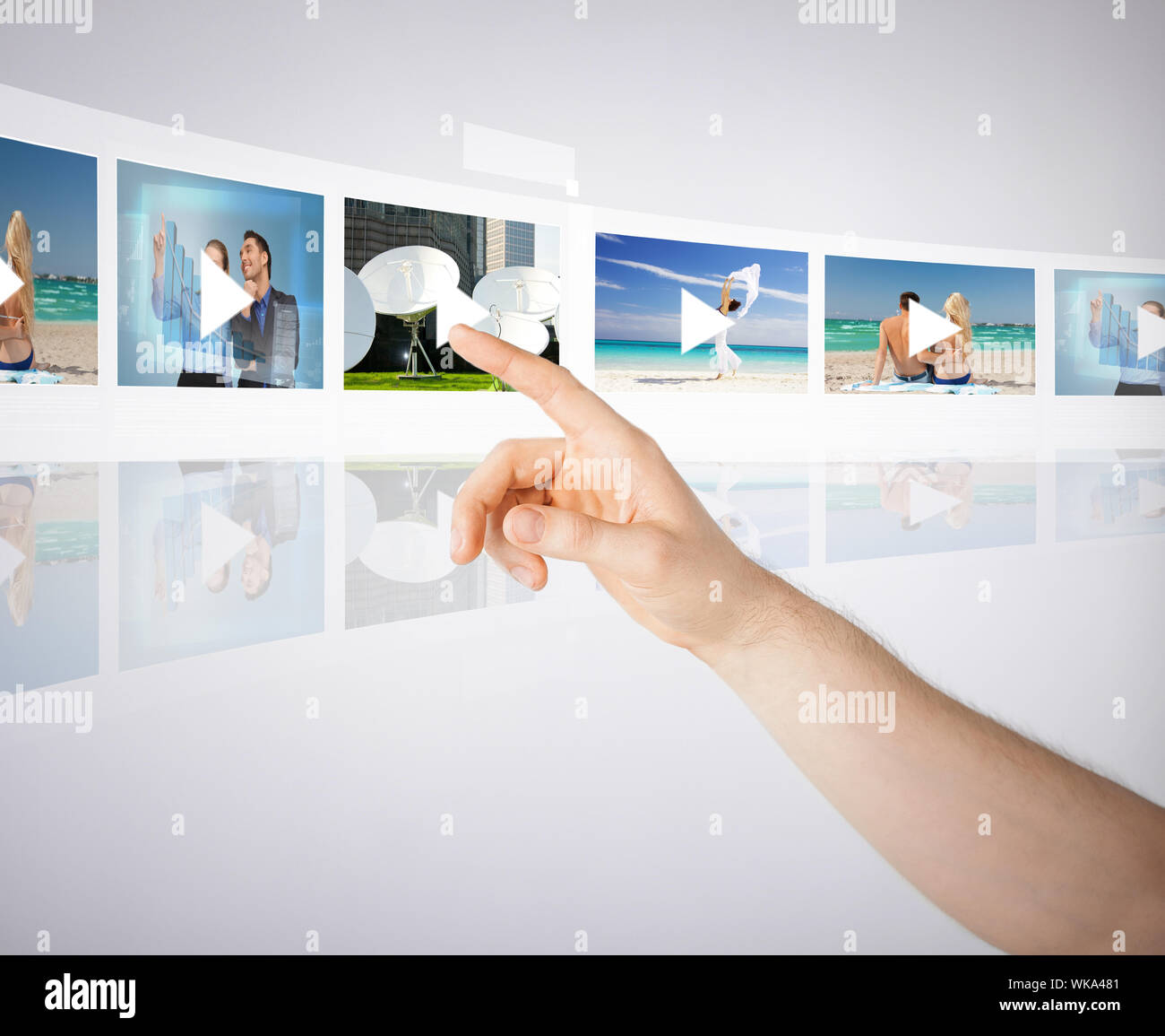 technology, internet, tv and virtual screens concept - man pressing ...