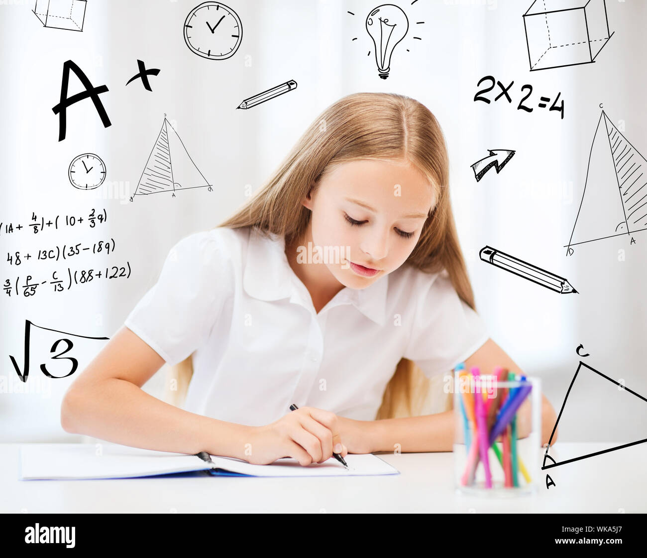little student girl drawing at school Stock Photo - Alamy