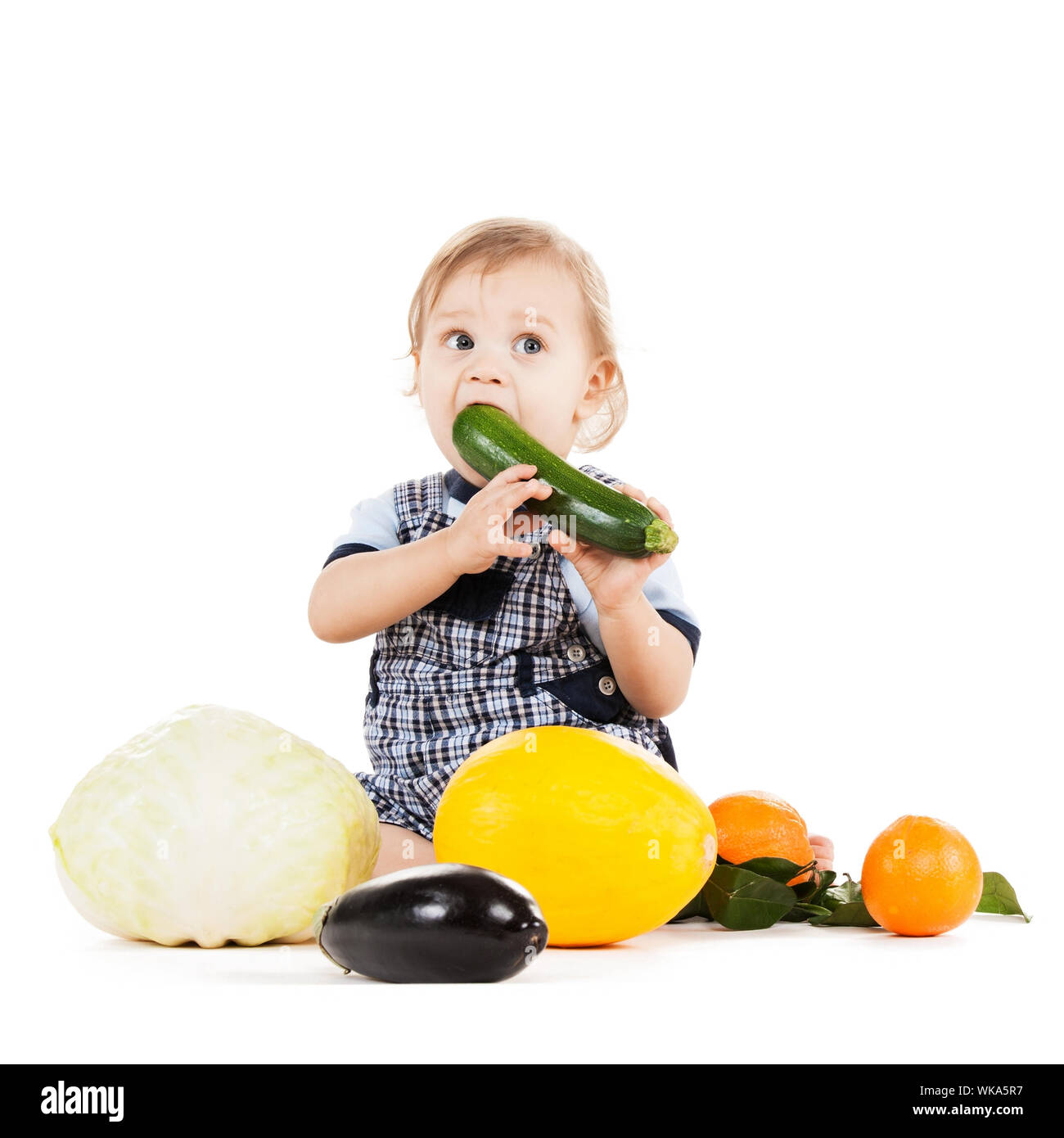 toddler eating squash Stock Photo - Alamy