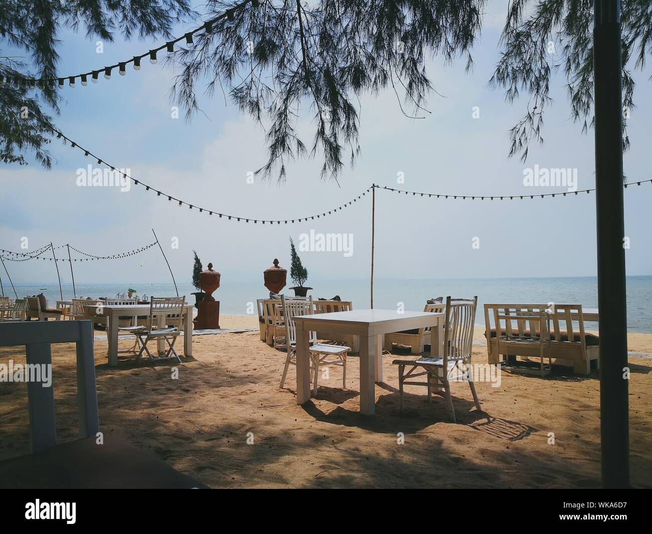 Tables on beach hi-res stock photography and images - Alamy