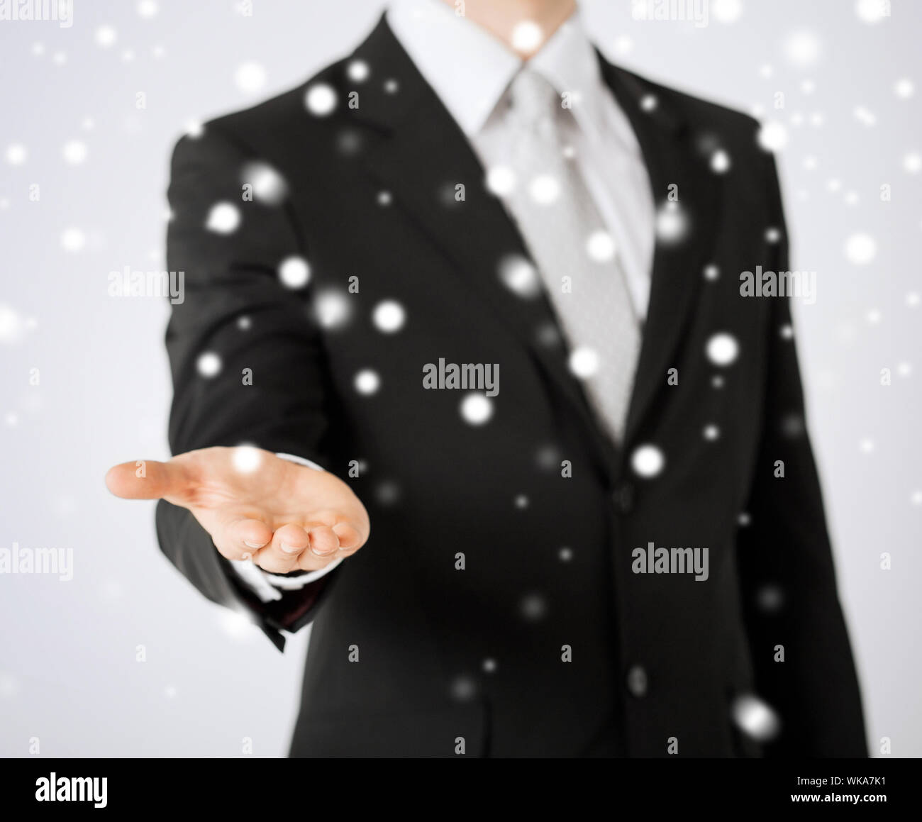 close up of mans hand showing something Stock Photo - Alamy