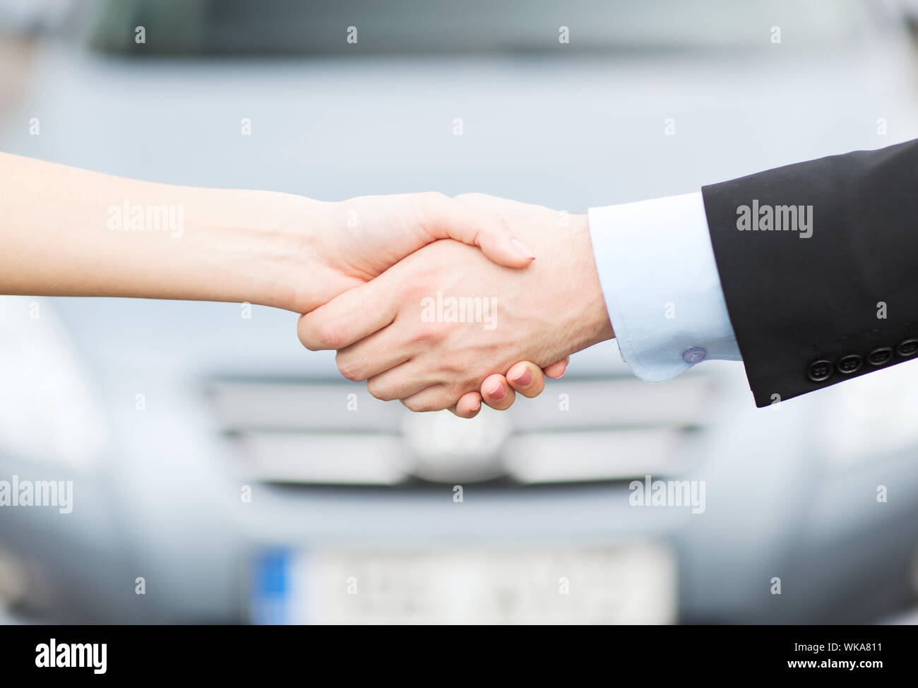 transportation, business, shopping and ownership concept - customer and ...