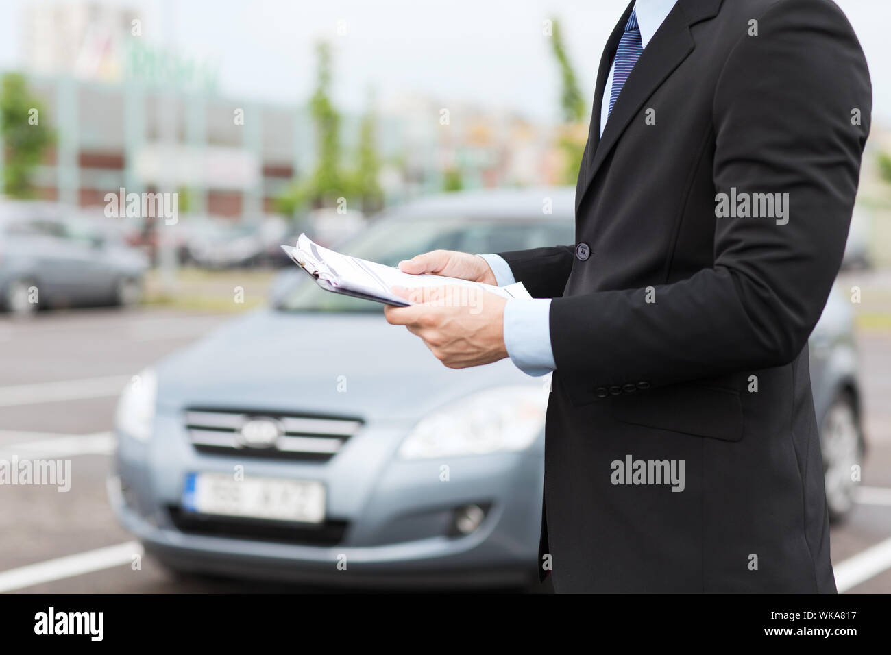 Car parking businessman documents hi-res stock photography and images ...