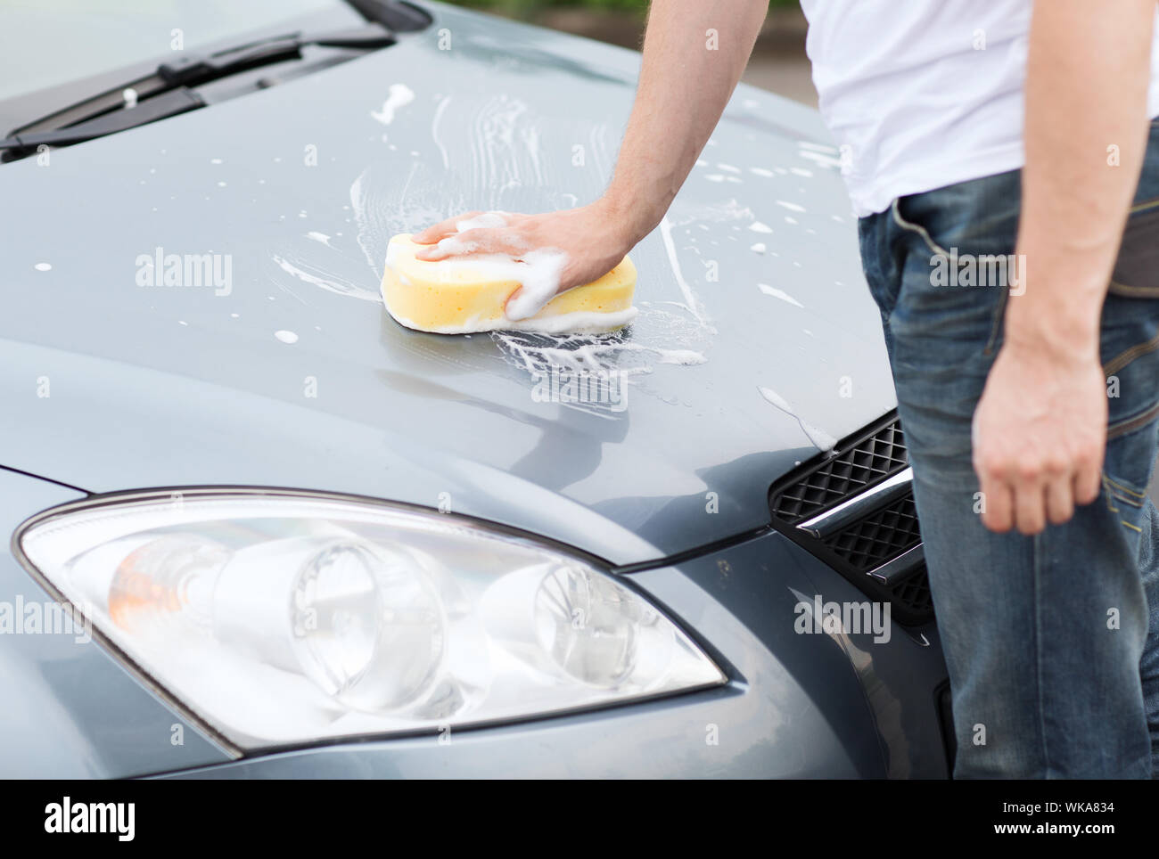 man washing a car Stock Photo - Alamy