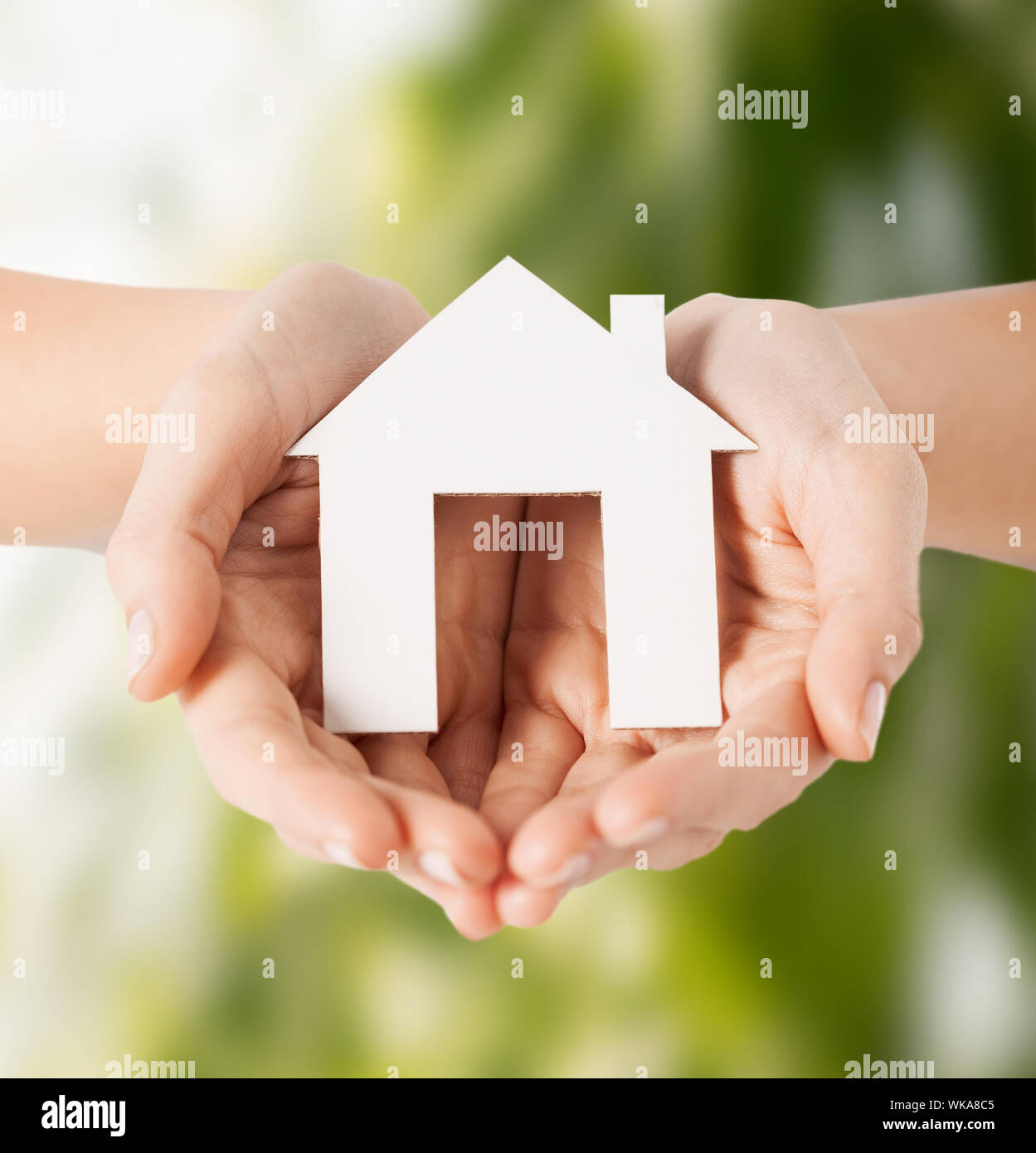 hands holding house Stock Photo - Alamy