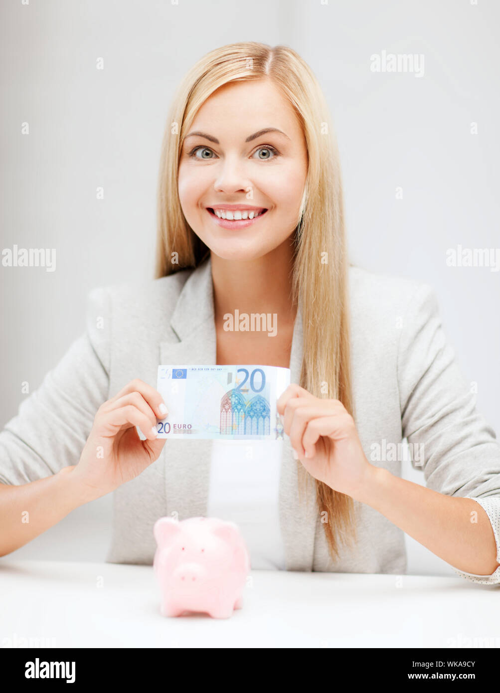 banking and finances concept - picture of lovely woman with piggy bank ...