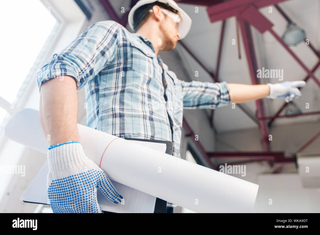 man with blueprint Stock Photo - Alamy