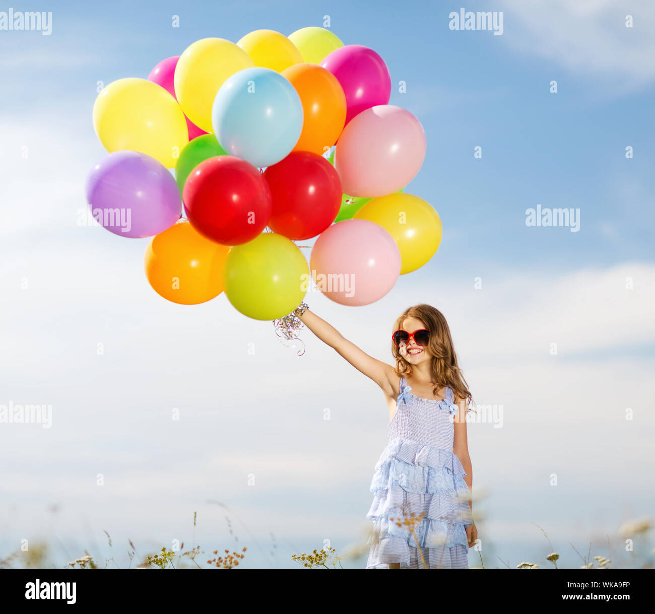 happy girl with colorful balloons Stock Photo - Alamy