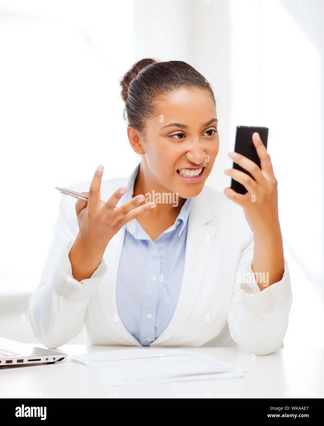 Girl african american cell phone upset hi-res stock photography and ...
