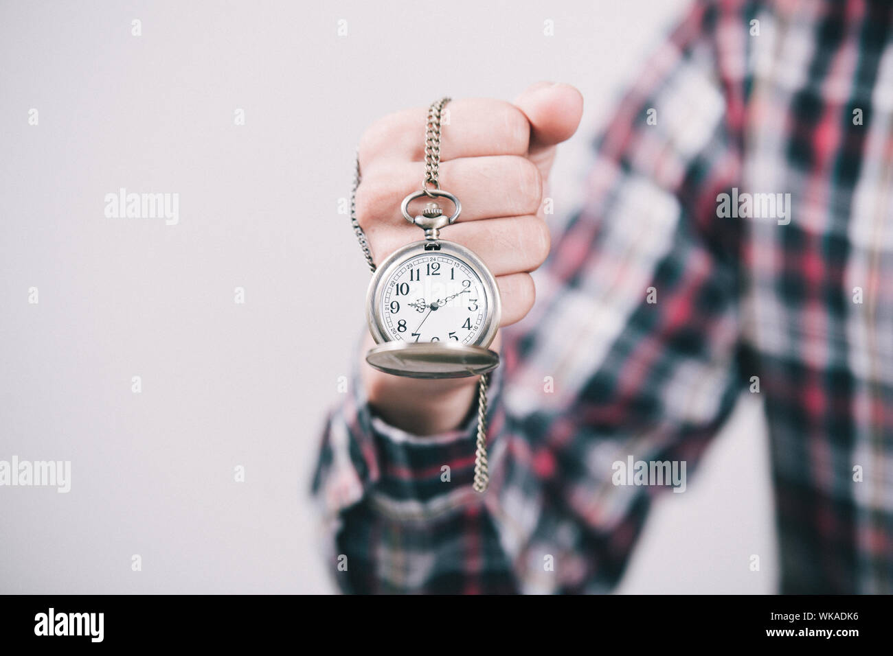 Man with pocket watch hi-res stock photography and images - Alamy