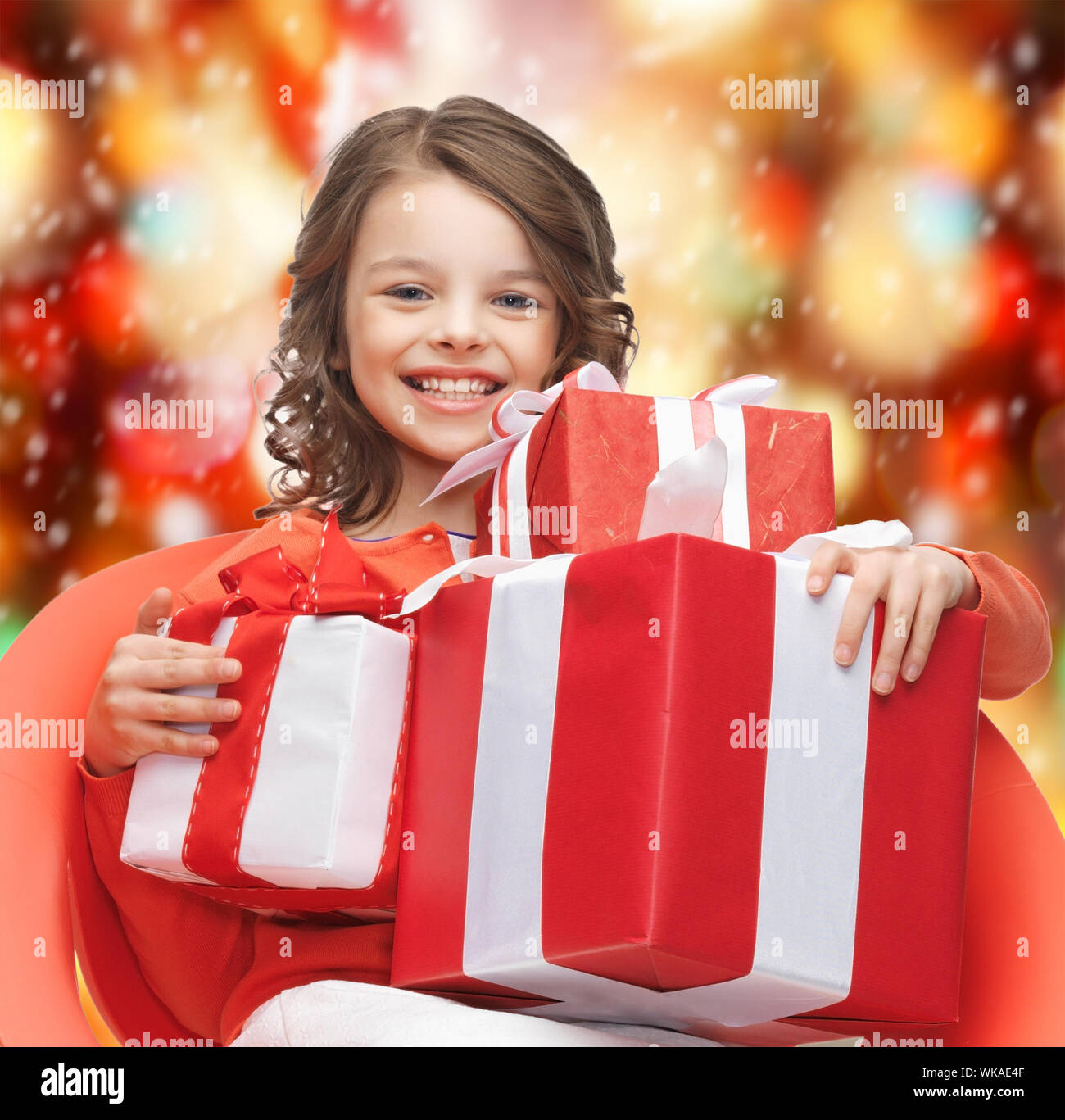 happy child girl with gift boxes Stock Photo - Alamy