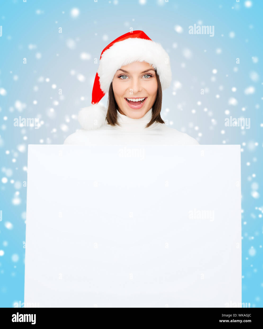 christmas, x-mas, people, advertisement, sale concept - happy woman in ...