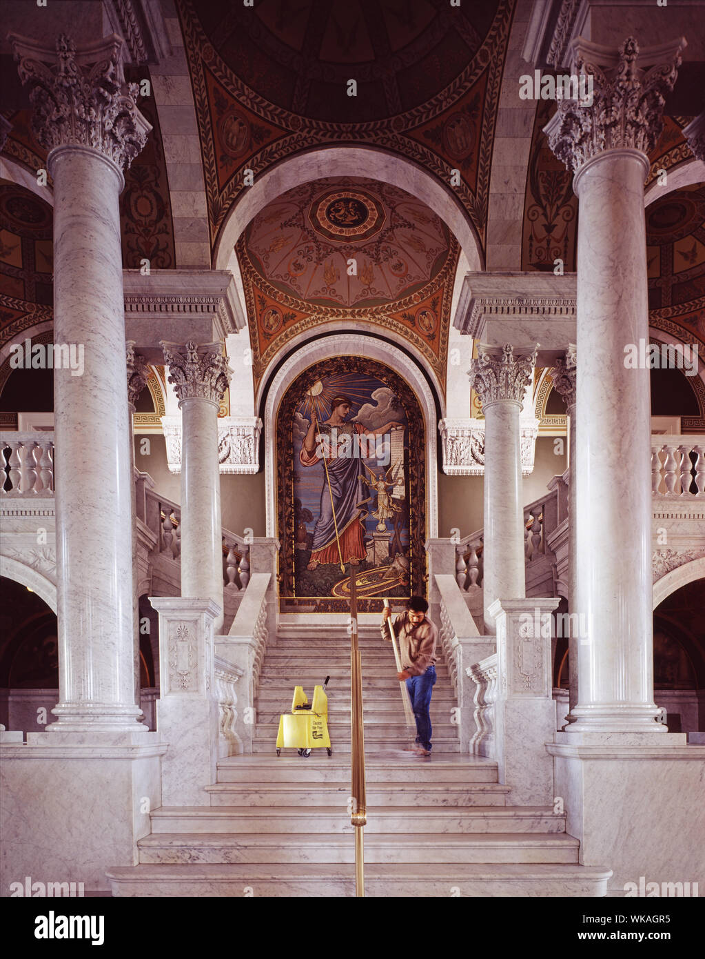 Janitor cleans the floor in front of the iconic Minerva in the Great ...