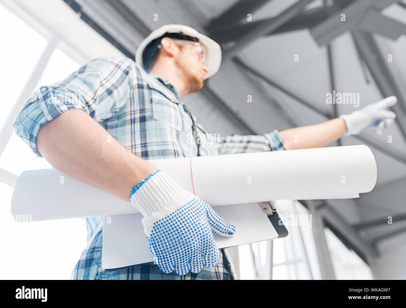 man with blueprint Stock Photo - Alamy