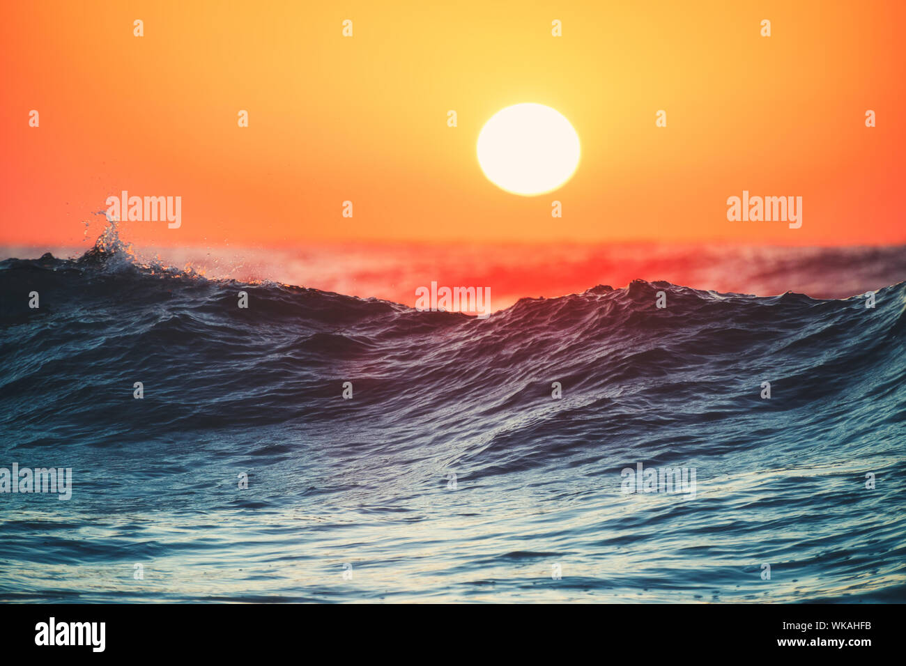 Beautiful blue sunrise wave Stock Photo - Alamy