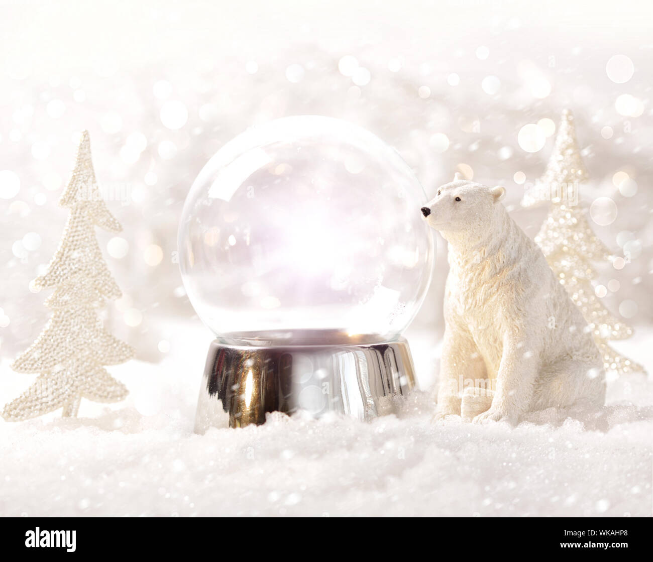 Snow globe in winter scene Stock Photo - Alamy