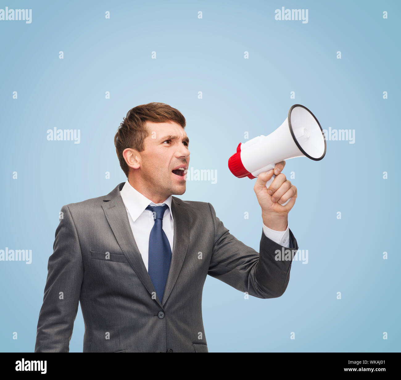 buisnessman with bullhorn or megaphone Stock Photo - Alamy