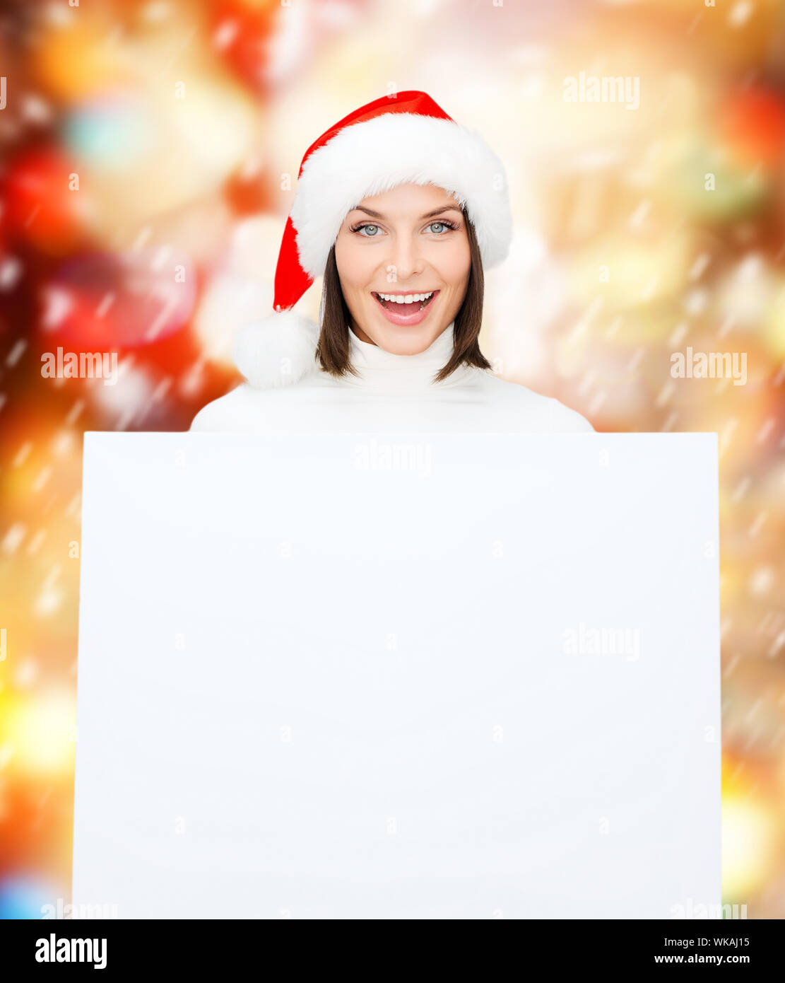 christmas, x-mas, people, advertisement, sale concept - happy woman in ...