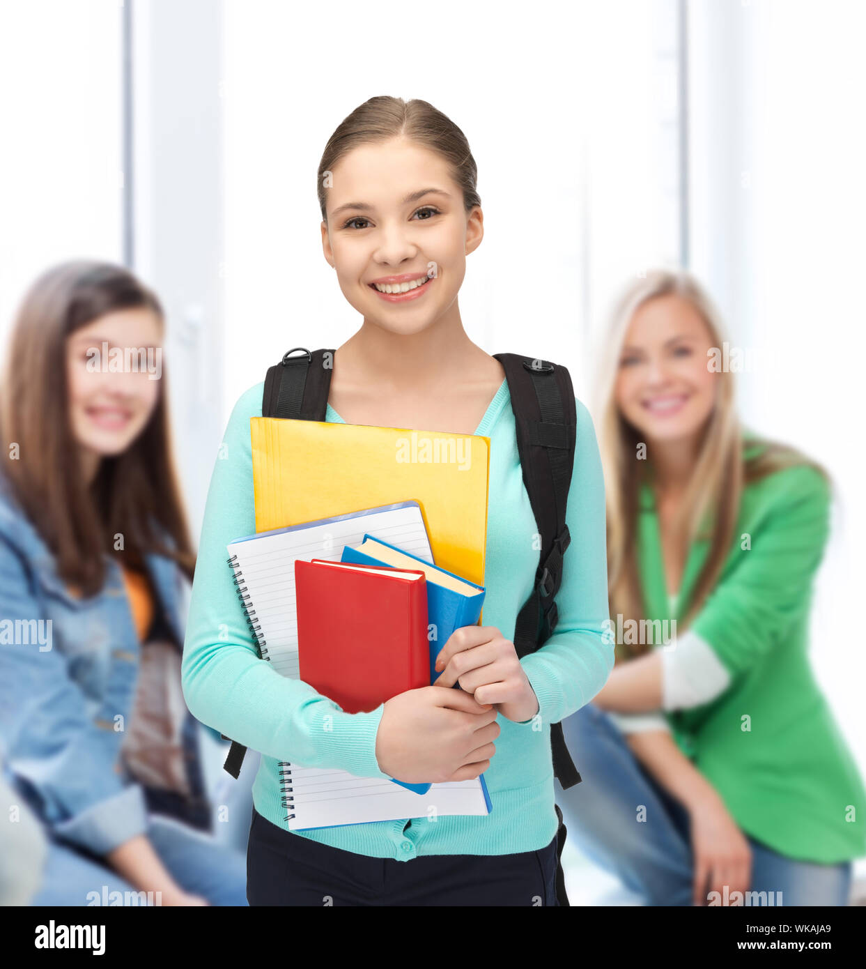 student with books and schoolbag Stock Photo - Alamy