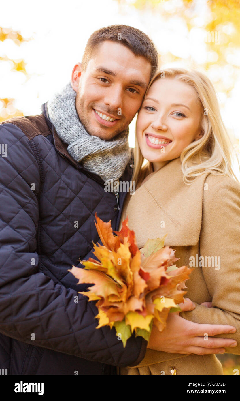 romantic couple in the autumn park Stock Photo - Alamy