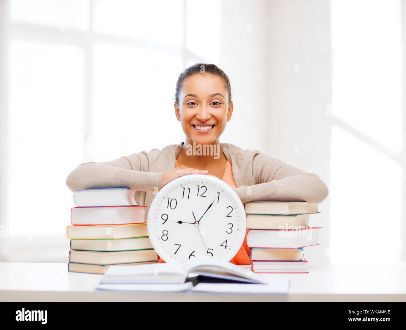 African teacher clock hi-res stock photography and images - Alamy
