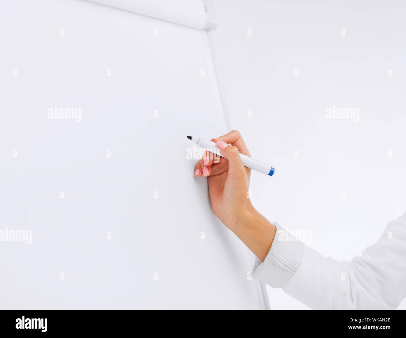 businesswoman working with flip board in office Stock Photo - Alamy
