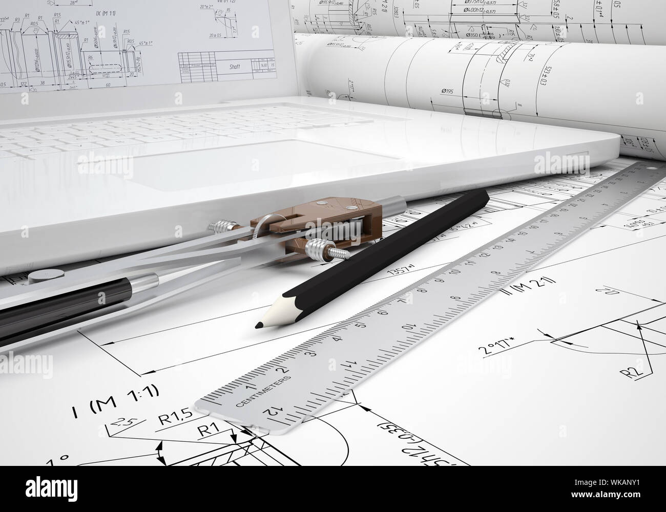 Scrolls engineering drawings and laptop. Desk Engineer Stock Photo - Alamy