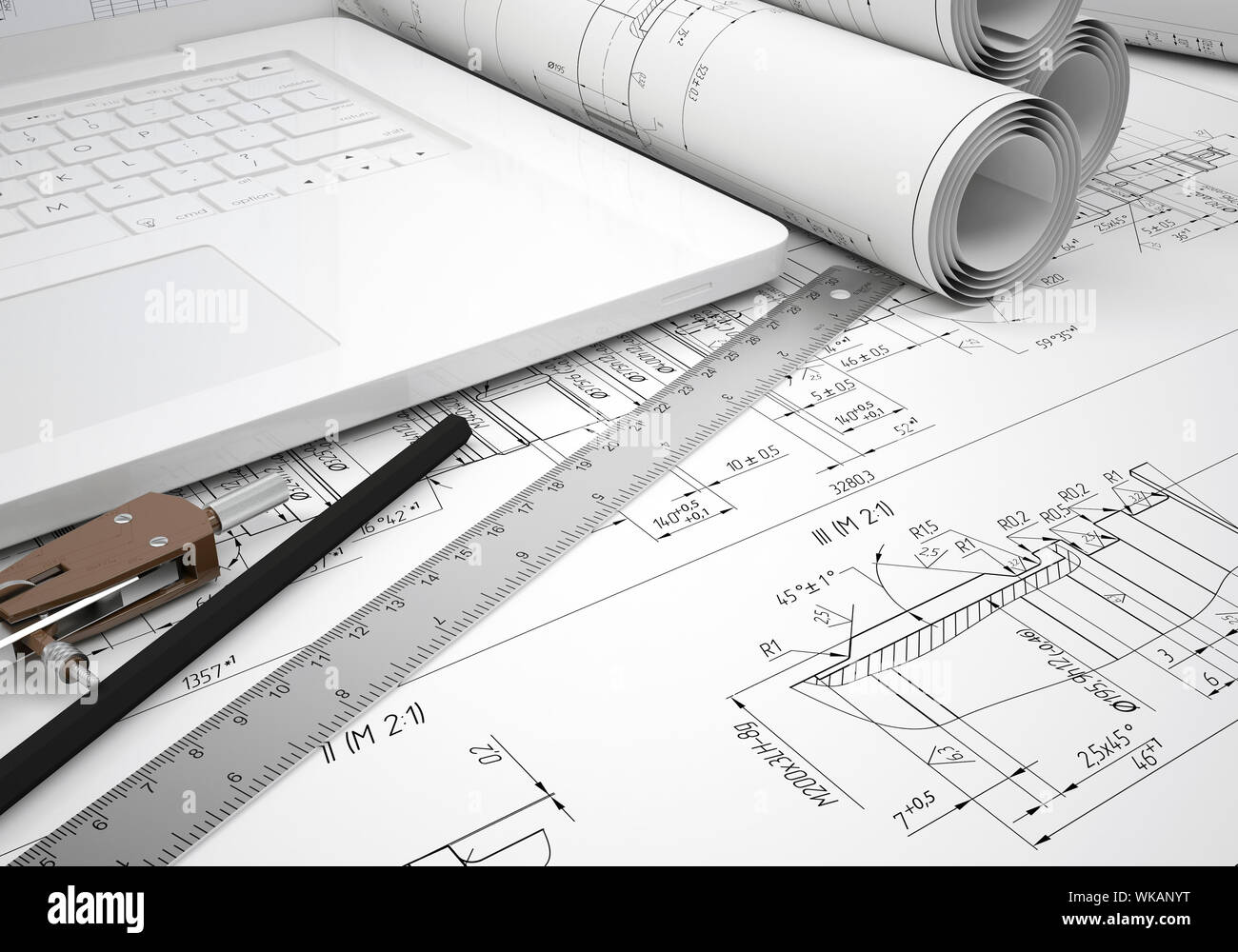 Scrolls engineering drawings and laptop. Desk Engineer Stock Photo - Alamy