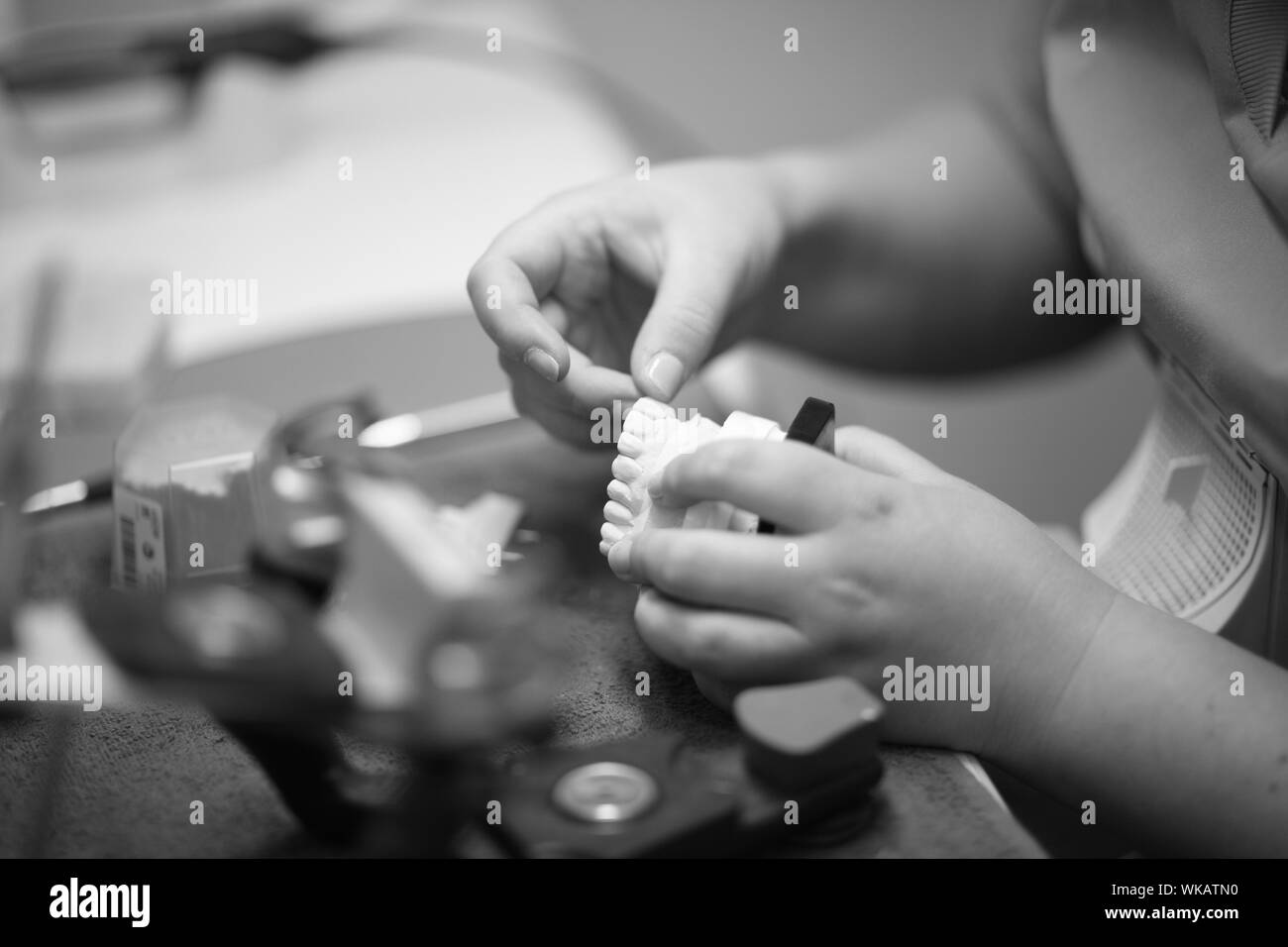 The process of manufacturing dentures in the dental laboratory Stock ...