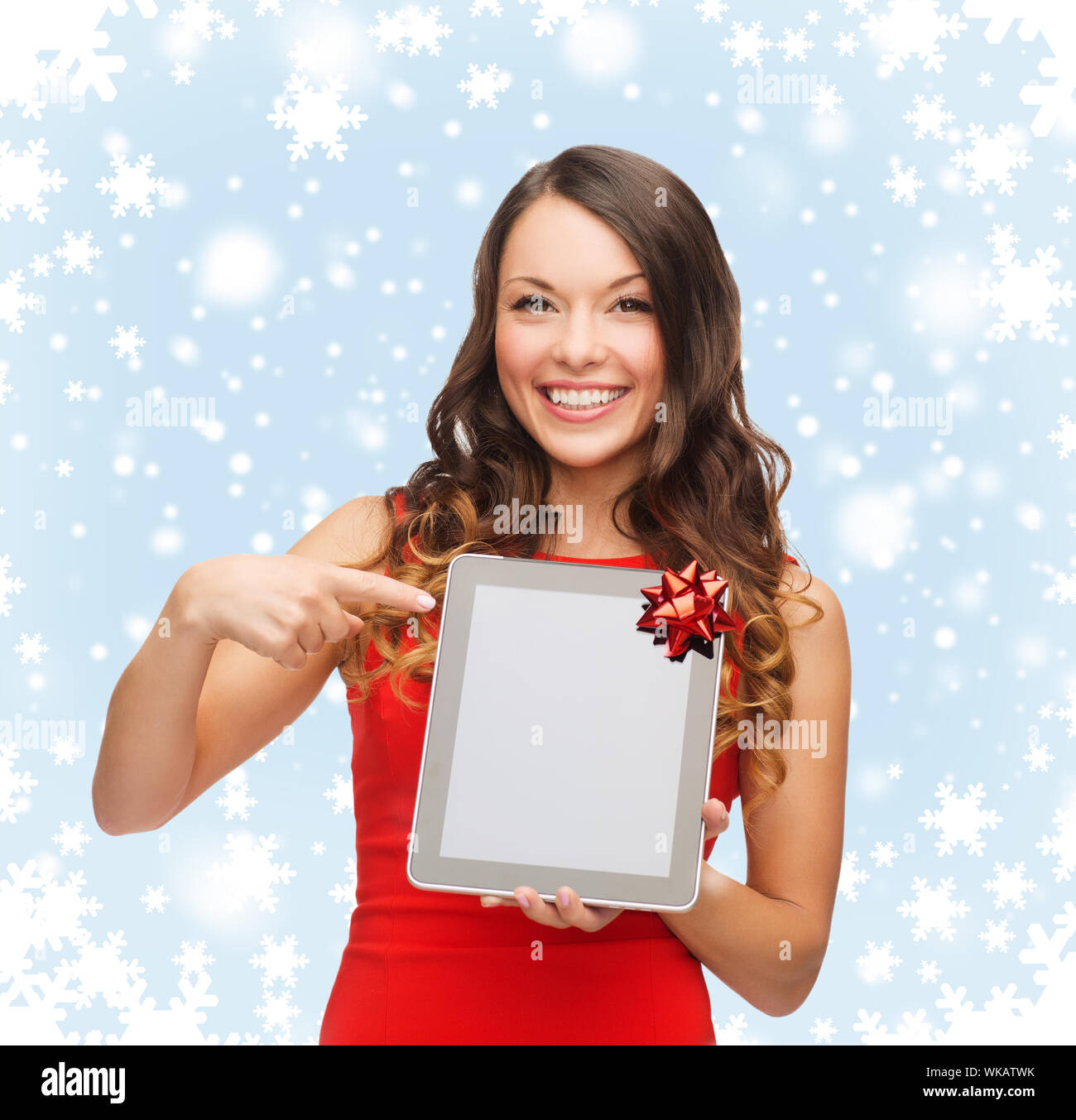 christmas, x-mas, electronics, gadget concept - three smiling women in ...