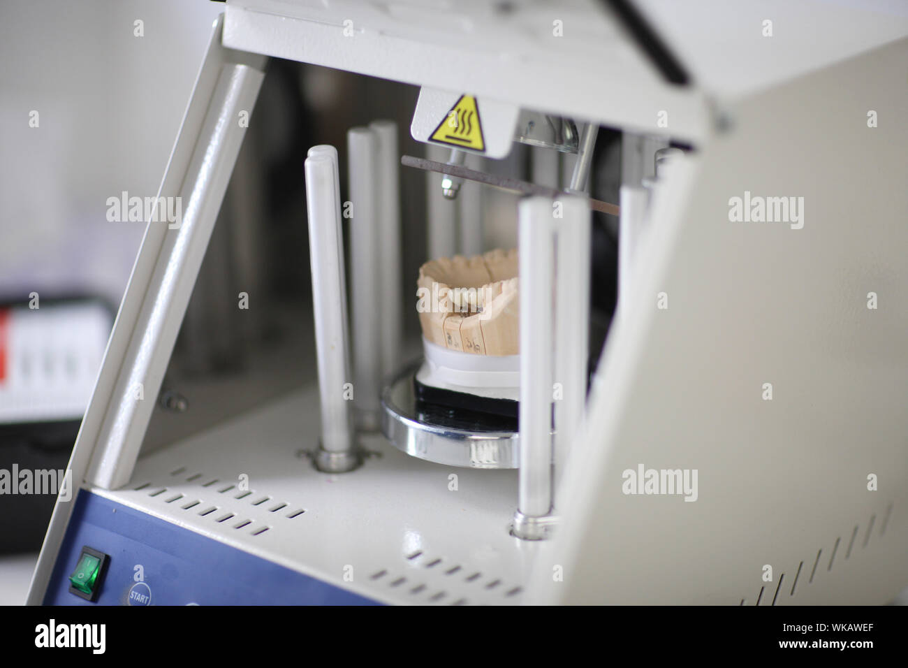 The process of manufacturing dentures in the dental laboratory Stock ...
