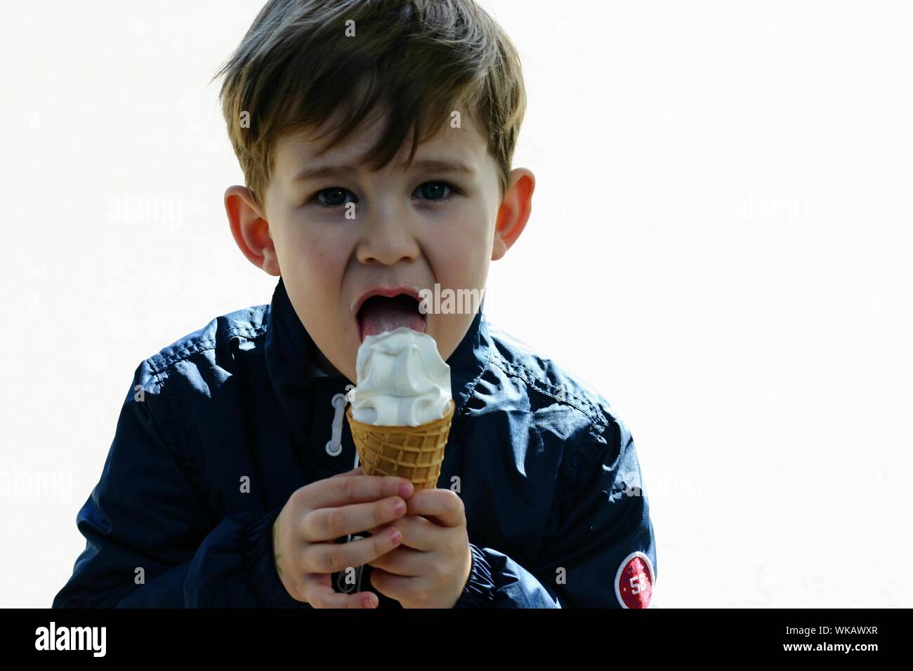 Cute boy is eating hi-res stock photography and images - Alamy