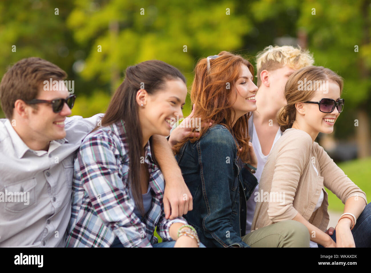 summer holidays, education, campus and teenage concept - group of ...