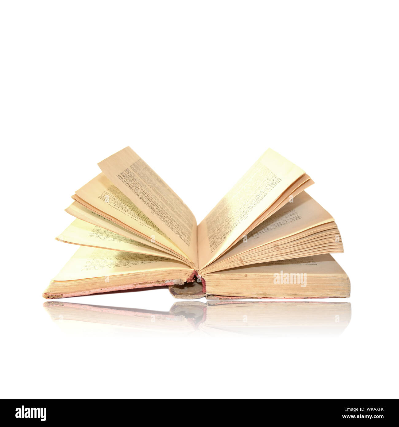 Open book on white Stock Photo - Alamy