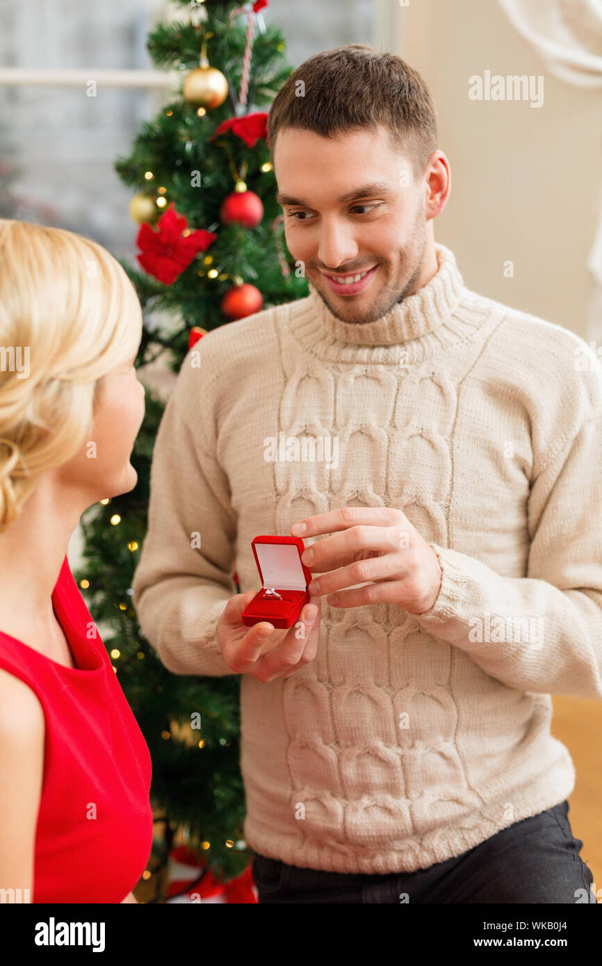 romantic man proposing to a woman Stock Photo - Alamy