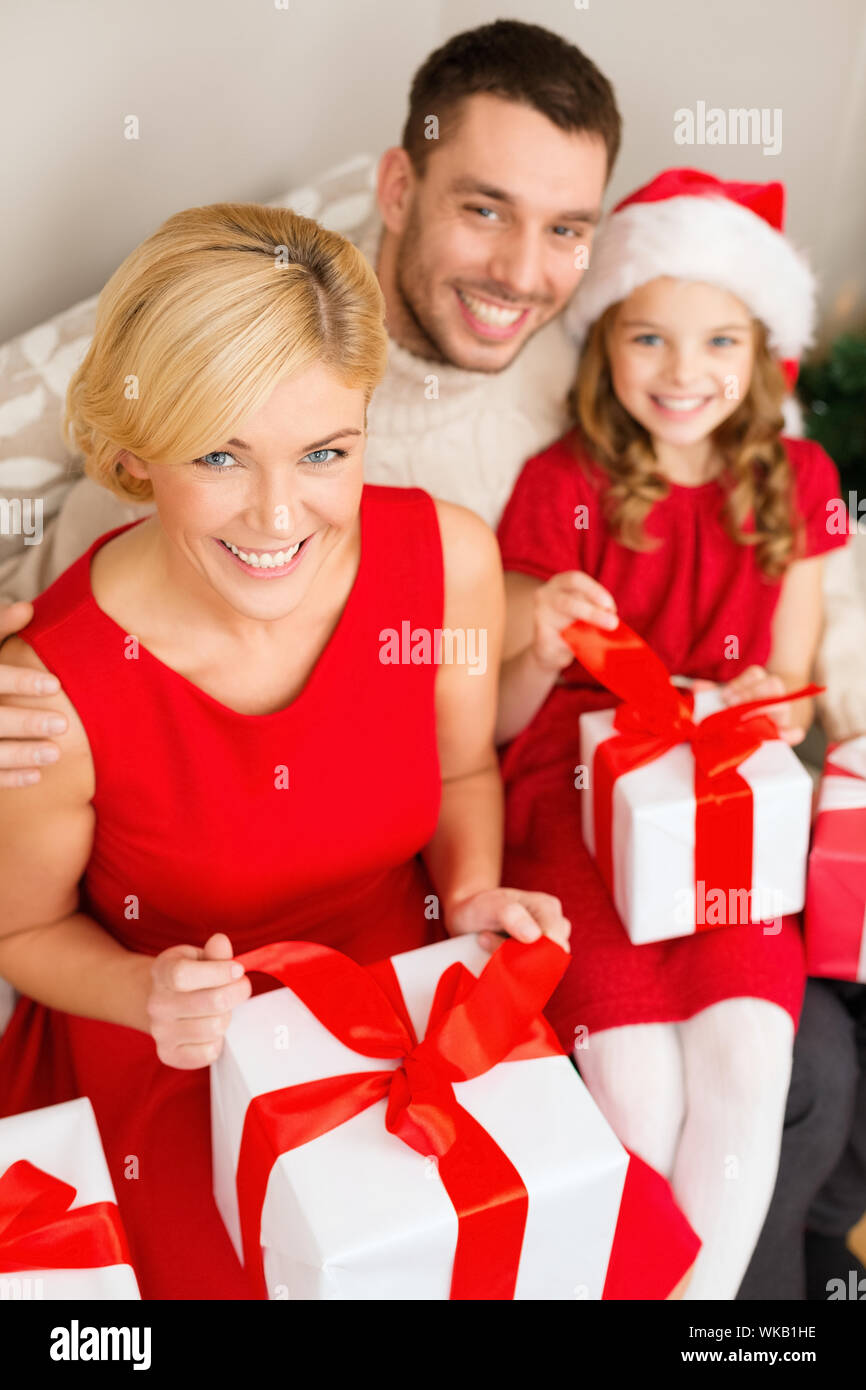 happy family opening gift boxes Stock Photo - Alamy
