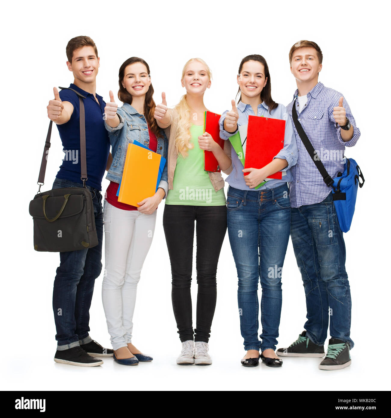 group of smiling students showing thumbs up Stock Photo - Alamy