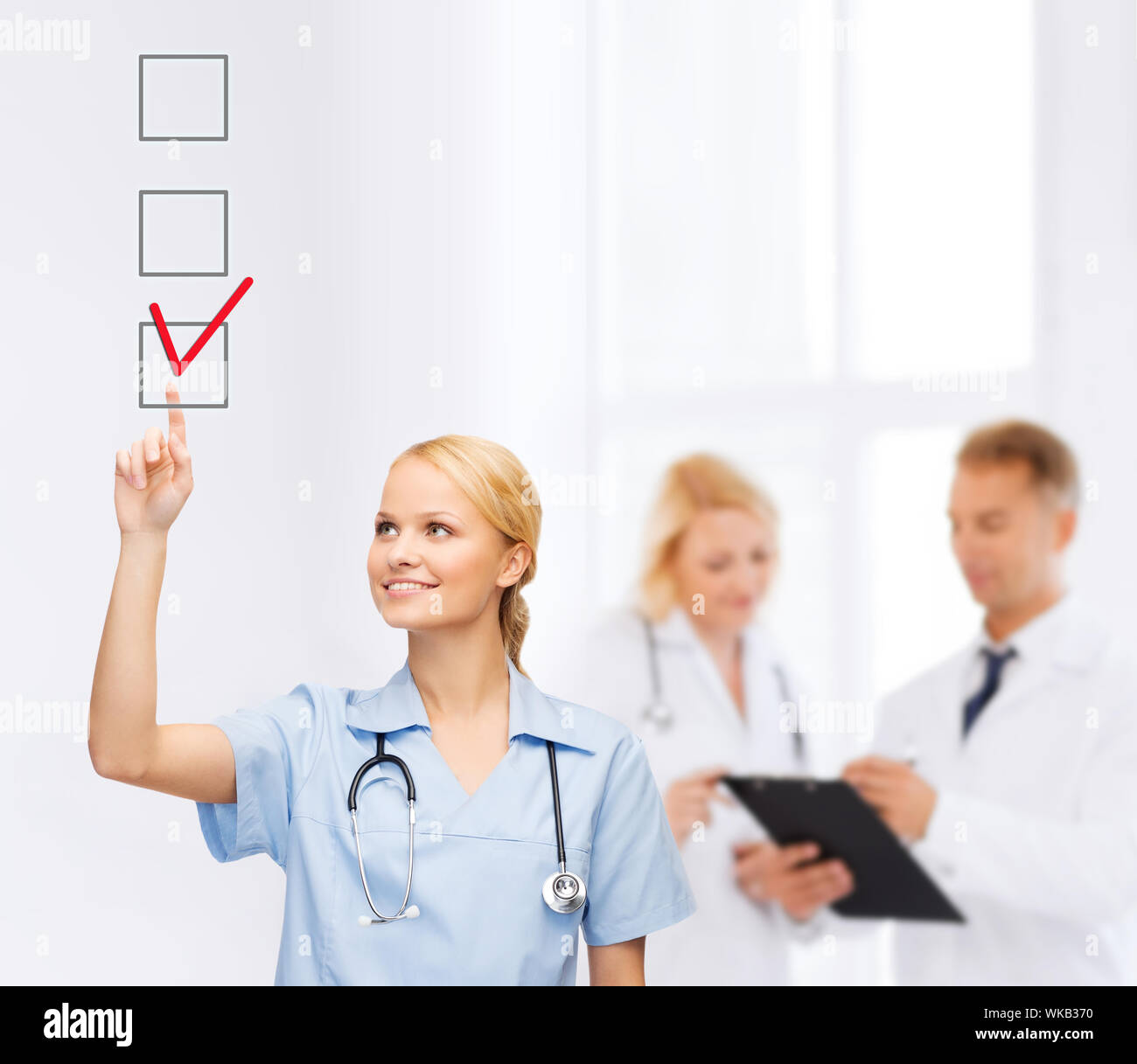 healthcare, medical and technology - young doctor or nurse with marker ...