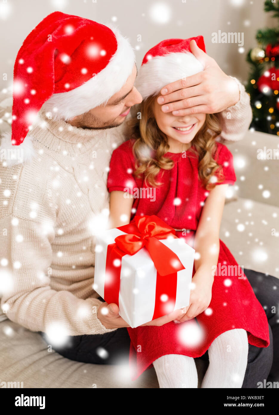 family, christmas, x-mas, winter, happiness and people concept ...