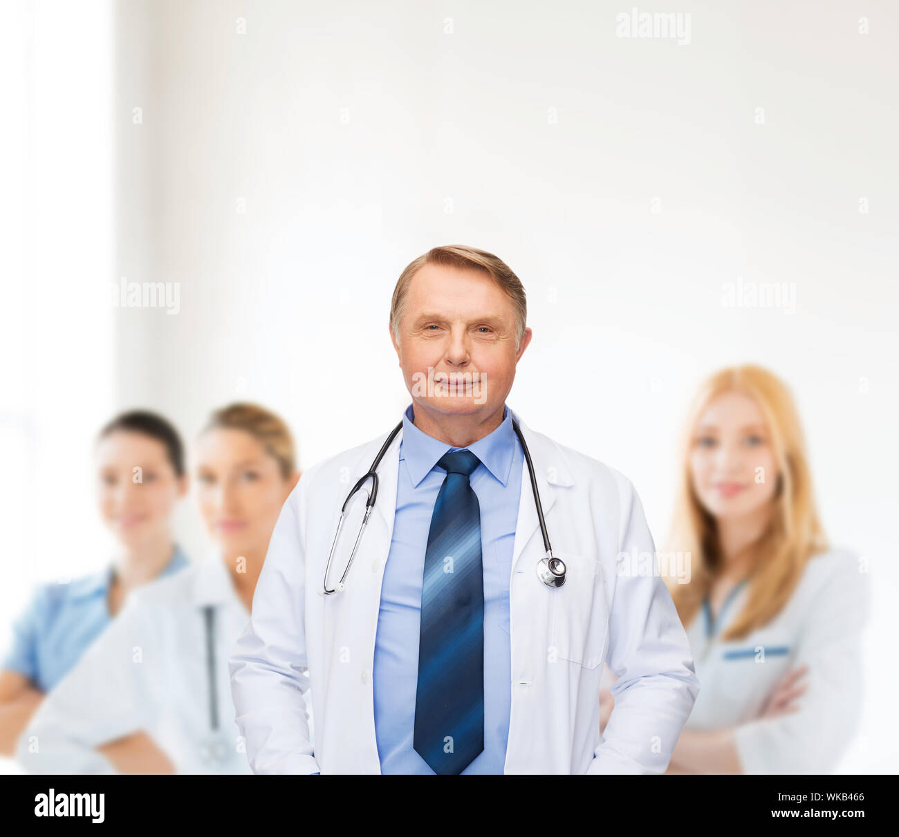 smiling doctor or professor with stethoscope Stock Photo - Alamy